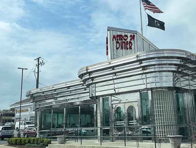 Chrome and glass gleaming in daylight, a retro masterpiece that makes every passing driver slow down.