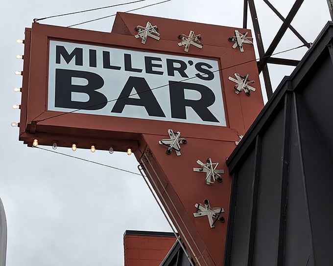 That vintage arrow sign has been pointing hungry people toward happiness since your grandparents were dating here.