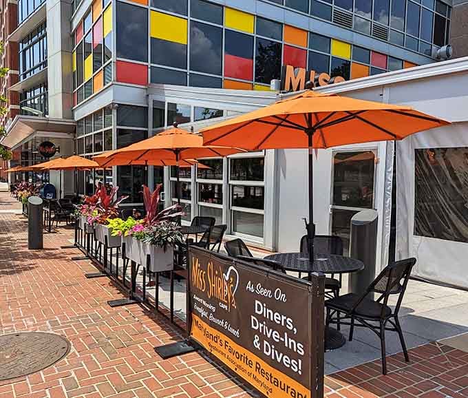 Outdoor seating with bright orange umbrellas for when you want your breakfast with a side of sunshine.