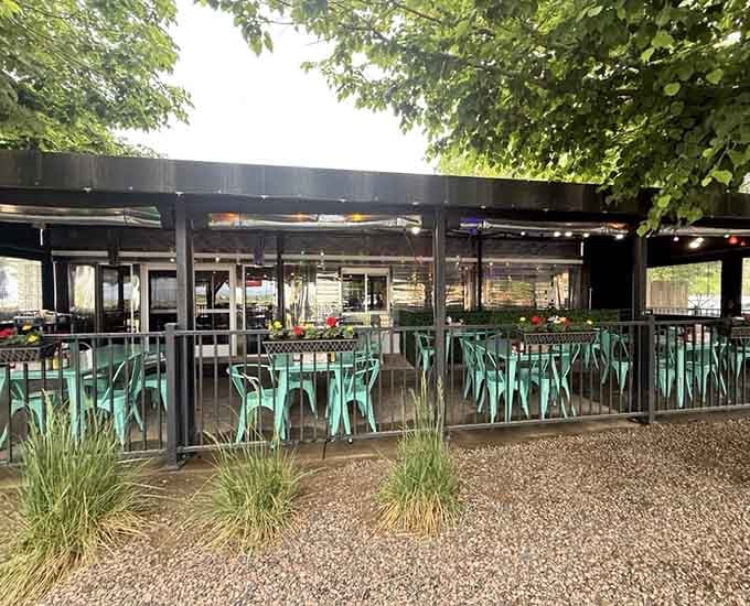 The outdoor patio extends the 1950s vibe into the fresh Colorado air, perfect for sunny day dining adventures.