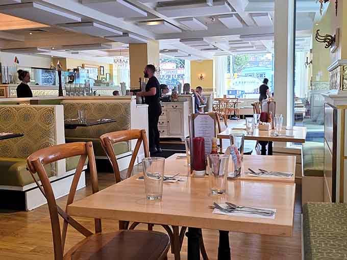 Simple wooden tables and comfortable seating create the perfect setting for lingering over one more cup of coffee.