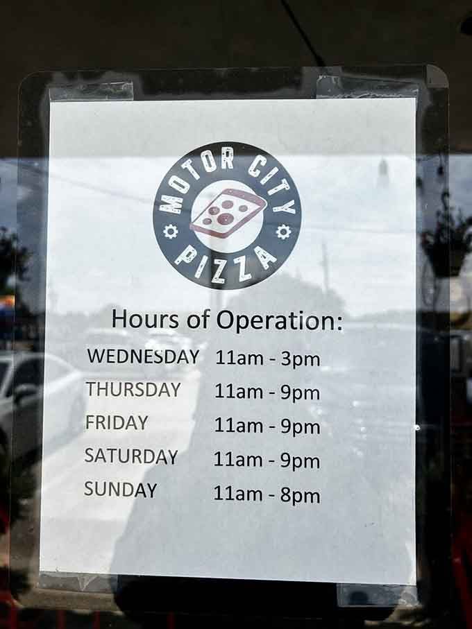 Operating hours posted clearly, because knowing when to get your Detroit-style fix is half the battle.