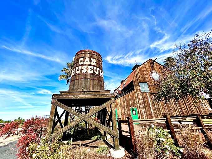That water tower announces your destination loud and clear, because subtlety wasn't invented yet when this barn was built for show.