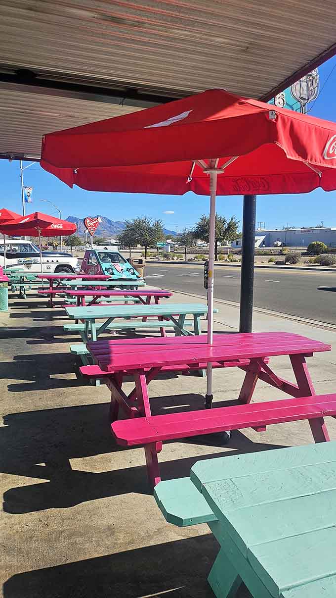 Outdoor seating in candy colors lets you soak up Route 66 vibes while enjoying your meal al fresco.