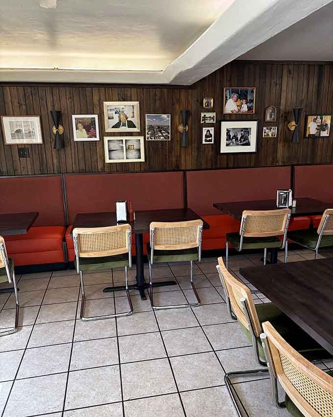 Red booths, wood paneling, and photographs create an atmosphere where everyone's welcome and nobody leaves hungry or unhappy.