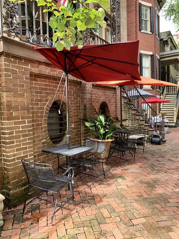 A charming brick courtyard where you can wait in comfort before your Southern food adventure begins upstairs.