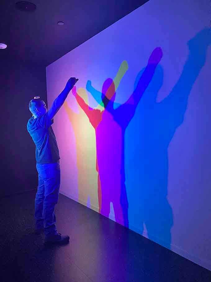 Finally, proof that you contain multitudes&mdash;literally multiple colorful versions of yourself doing interpretive dance on the wall.