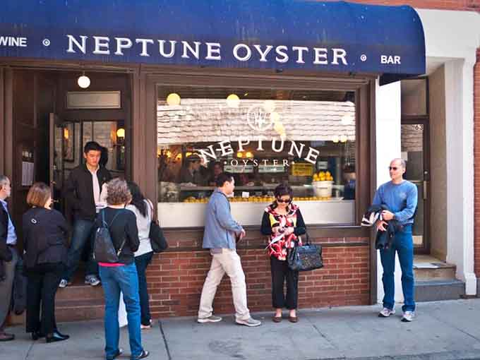 The scene outside tells you everything: when people wait this patiently, something special awaits inside those doors.