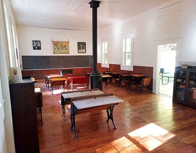 Inside the historic schoolhouse, wooden desks and a pot-bellied stove evoke simpler times without standardized testing stress.
