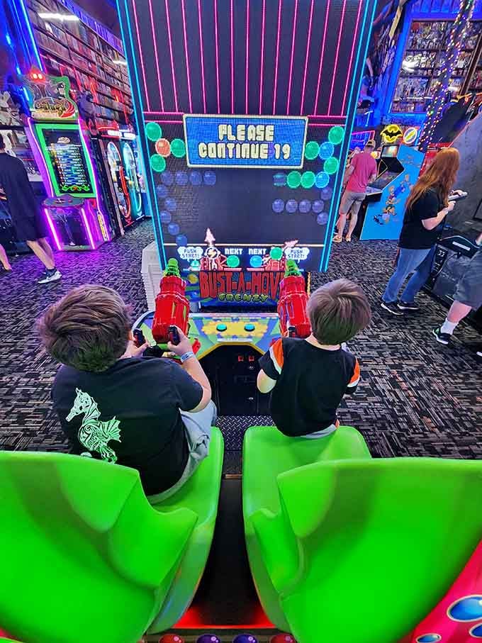 Two young gamers discover the joy of cooperative arcade play, creating memories that'll last a lifetime.