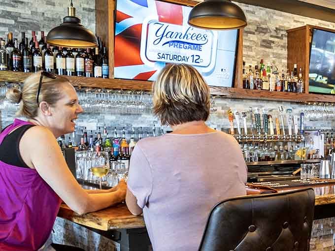 The bar area where friendly conversations flow as smoothly as the local wines from nearby vineyards.