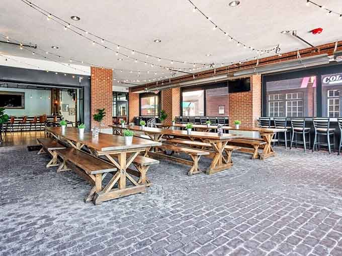 String lights and picnic tables on the covered patio create an outdoor oasis perfect for warm Ohio evenings and cold beers.