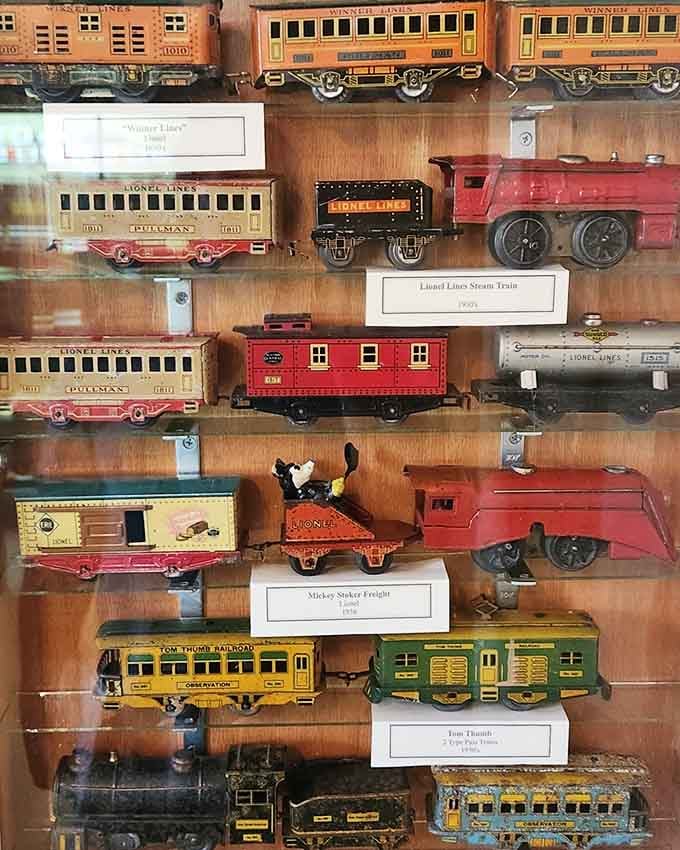 Lionel train cars lined up like soldiers showcase the craftsmanship that made these toys family heirlooms worth preserving forever.