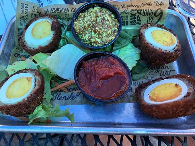 Scotch eggs are British pub perfection: sausage-wrapped, breaded, and fried into golden spheres of pure joy and comfort.