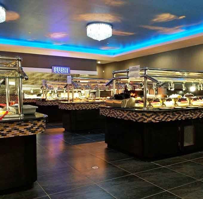 Buffet stations stretching into the distance like a delicious horizon, each section promising new discoveries for your eager plate.