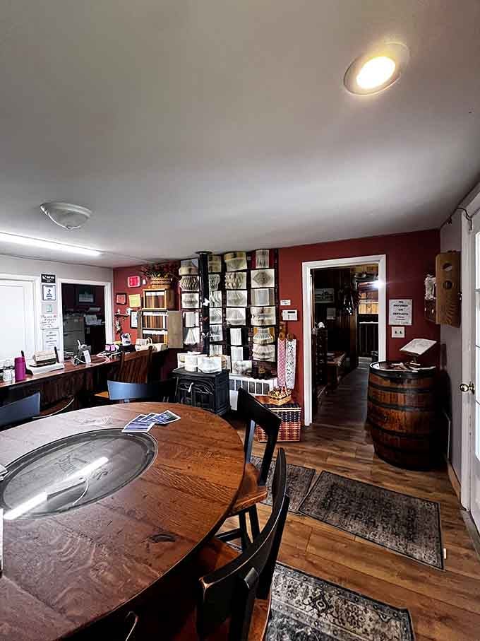 The checkout area features custom wood tables that prove even functional spaces deserve beautiful, lasting craftsmanship.