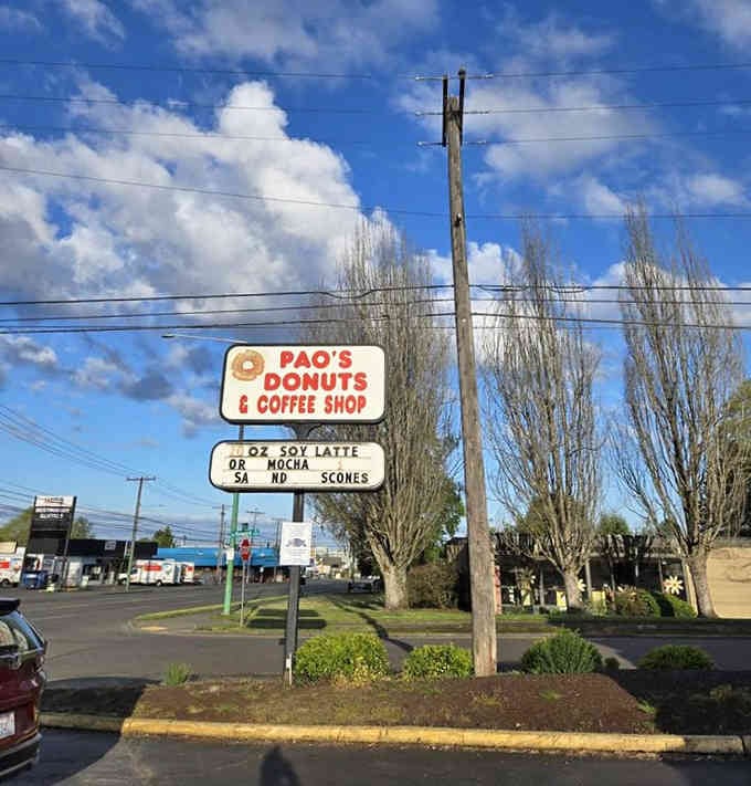 Even the sign outside knows what matters most: soy lattes, mochas, and those irresistible fresh scones daily.