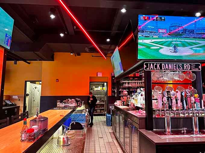 The bar setup promises cold drinks and big screens, perfect for watching the game while your pizza masterpiece bakes.