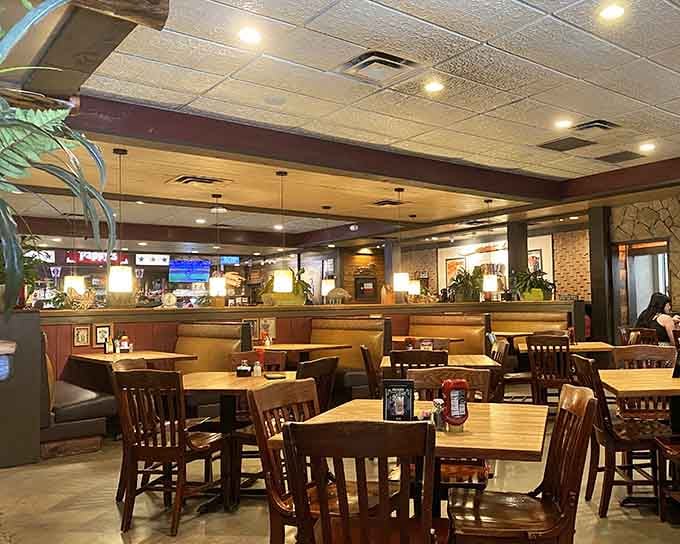 Spacious dining room with booths and tables ready to host everything from date nights to family reunions.