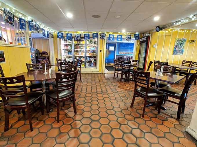 The bright dining room with its distinctive hexagonal floor tiles adds character to every meal.