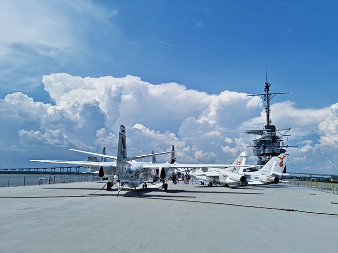 Jets and propeller planes coexist peacefully on deck, their fighting days behind them, their teaching days just beginning.