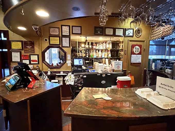 The bar area displays awards and accolades, proof that this place has earned its reputation among local diners.