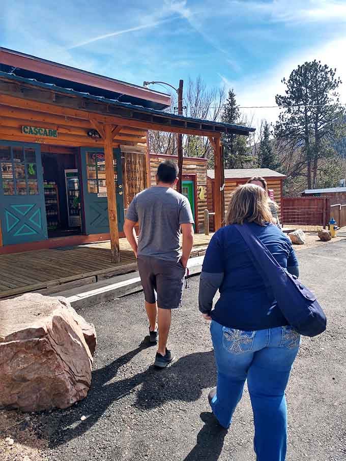 Visitors approaching pickle paradise, completely unaware their snack game is about to level up in spectacular fashion right now.