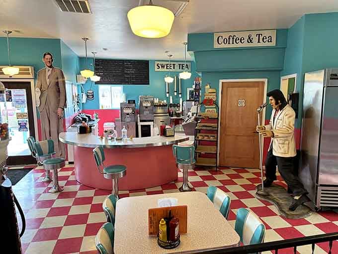 Step into a diner where the checkerboard floor and chrome stools transport you straight to 1955.