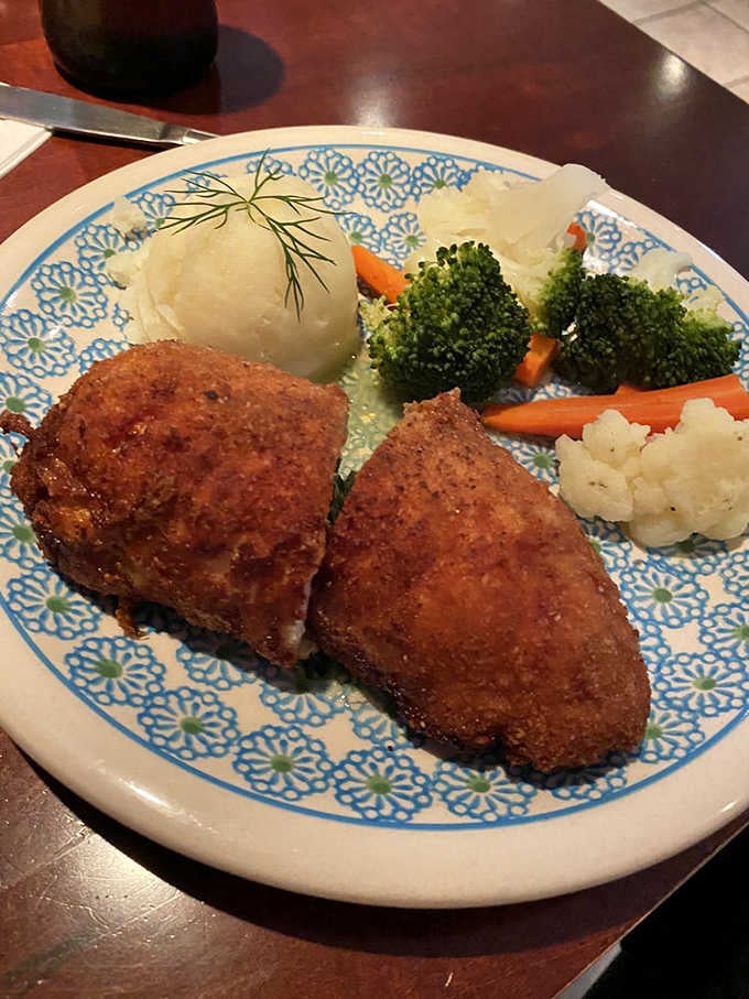 Chicken Kiev done right: crispy outside, tender inside, and vegetables that actually look like they want to be eaten.