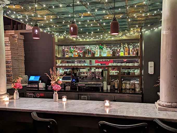 The bar glows with string lights and possibility, ready to mix whatever your pizza-loving heart desires.