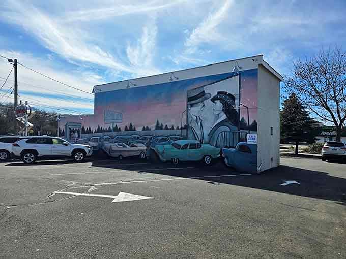 Even the parking lot gets the retro treatment with vintage car murals that make every visit feel like cruising.