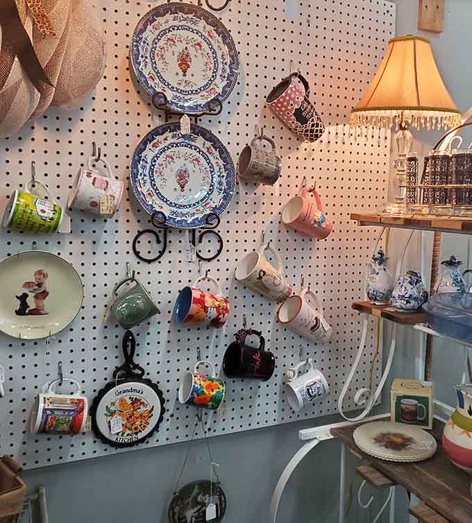 Vintage mugs hanging like a caffeinated art gallery, each one representing someone's favorite morning coffee ritual from yesteryear.