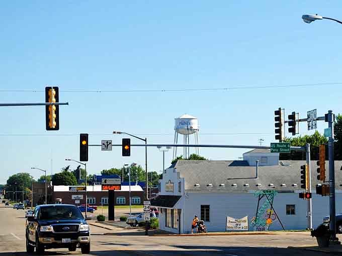 Peru Street captures small-town Illinois at its finest, where water towers and local businesses create an authentically American landscape.