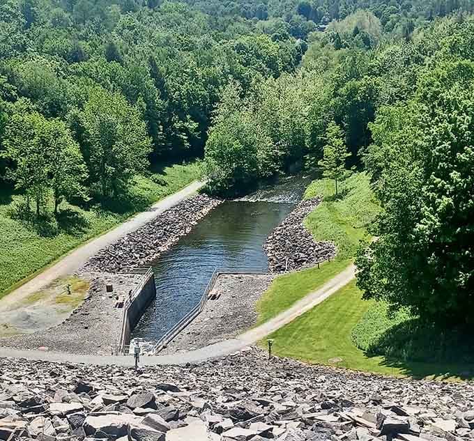 Engineering meets nature at the dam, where human ingenuity created something that actually improved the landscape somehow.