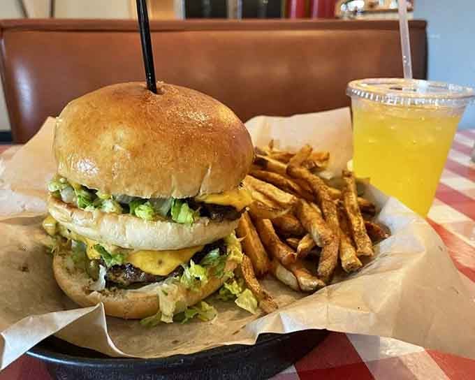 The Mac Daddy comes loaded with fries and enough cheese to make Wisconsin jealous of Florida's game.