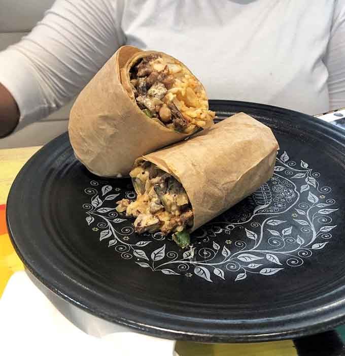 A burrito wrapped with precision and stuffed with generous fillings, ready to fuel your entire afternoon adventure.