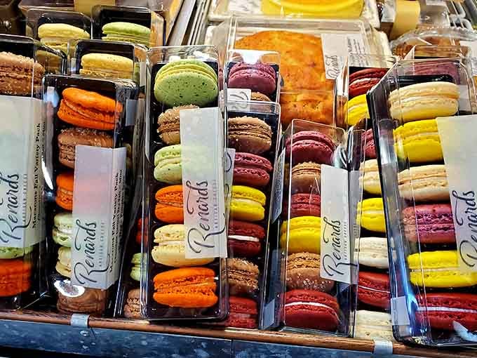 Colorful French macarons add unexpected elegance to the dessert case, showing this cheese shop has sophisticated sweet tooth too.