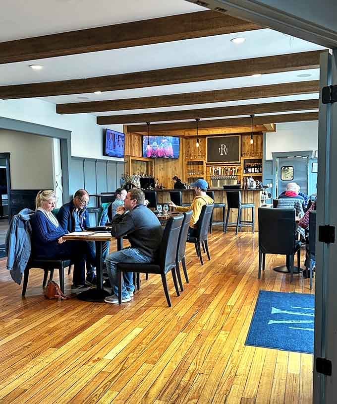 The dining room's open layout and abundant windows make every seat feel like the best table.