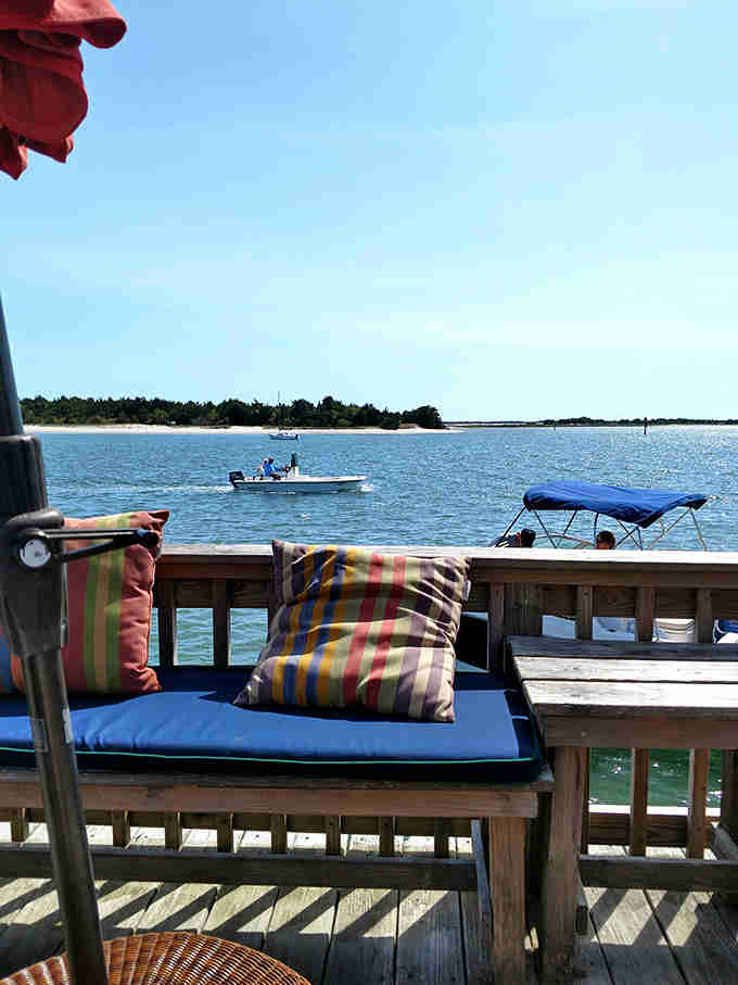 Boats drifting by, blue skies stretching forever, and cushioned seating that invites you to linger just a little longer.