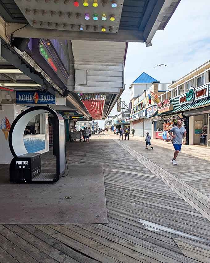 The boardwalk's classic architecture frames modern attractions, creating a timeline of seaside entertainment through the decades.