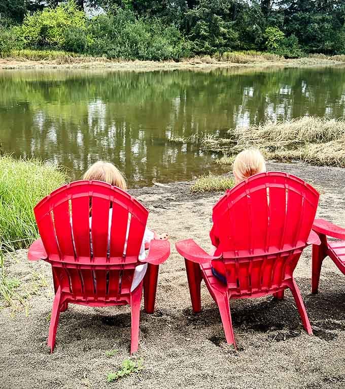 Those red Adirondack chairs facing the river are basically begging you to linger long after your plate's empty.