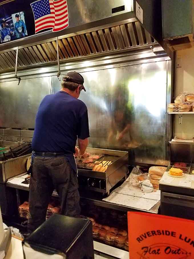 Watch the magic happen as skilled hands work the grill, transforming simple ingredients into lunchtime perfection.