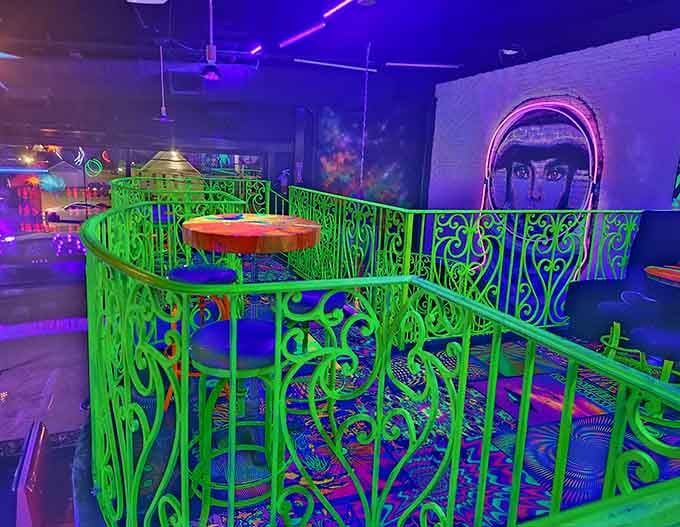 The upstairs seating area glows green like you've entered the VIP section of an alien mothership's lounge.