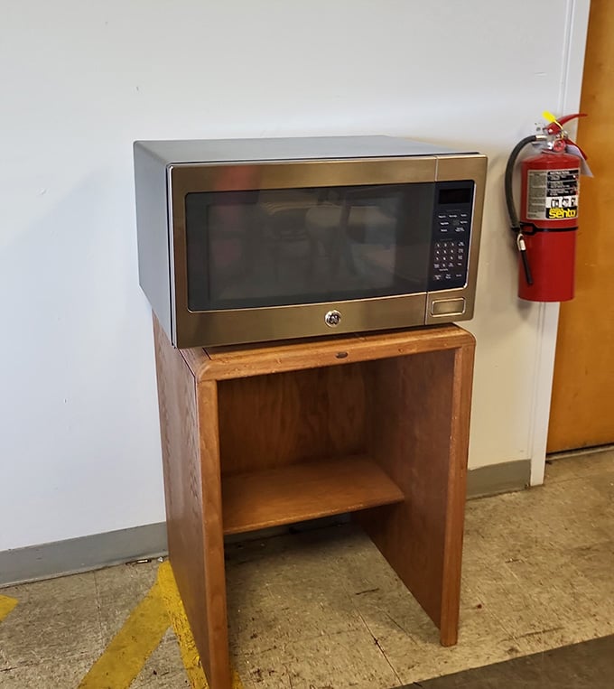 A perfectly good microwave sits ready for duty, because reheating leftovers shouldn't cost more than the leftovers themselves do.