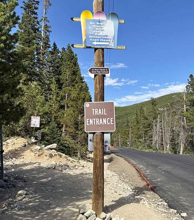 The trail entrance sign promises adventure ahead, and unlike most promises, this one actually delivers the goods.