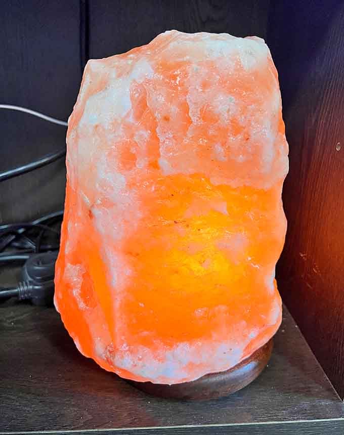 This glowing Himalayan salt lamp is like having a tiny piece of sunset permanently stationed in your living room.