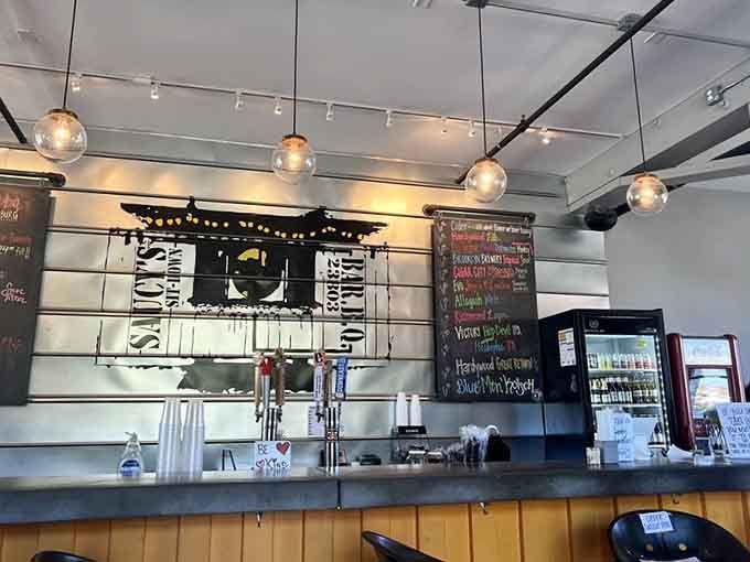The bar area features beer taps and that signature yellow counter, ready for your next barbecue adventure.