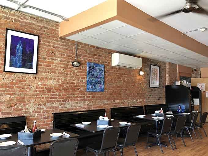 Exposed brick and local art create dining atmosphere that's sophisticated without trying too hard to impress anyone.
