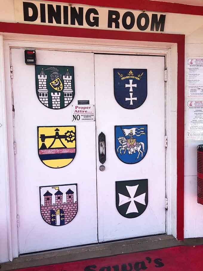 Polish coat of arms decorating the dining room entrance, reminding everyone they're about to experience authentic heritage cuisine.