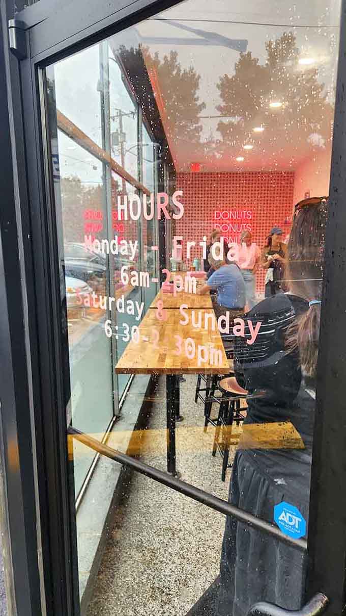 Hours posted on the door serve as both invitation and warning: come early or miss out.